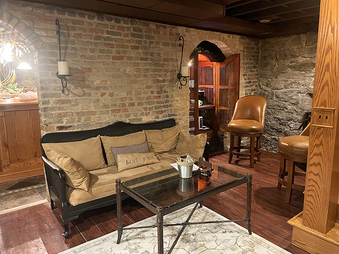 Wine Cellar Lounge: Rustic comfort meets sophisticated relaxation in this underground retreat where brick walls hold secrets and comfortable seating holds guests.
