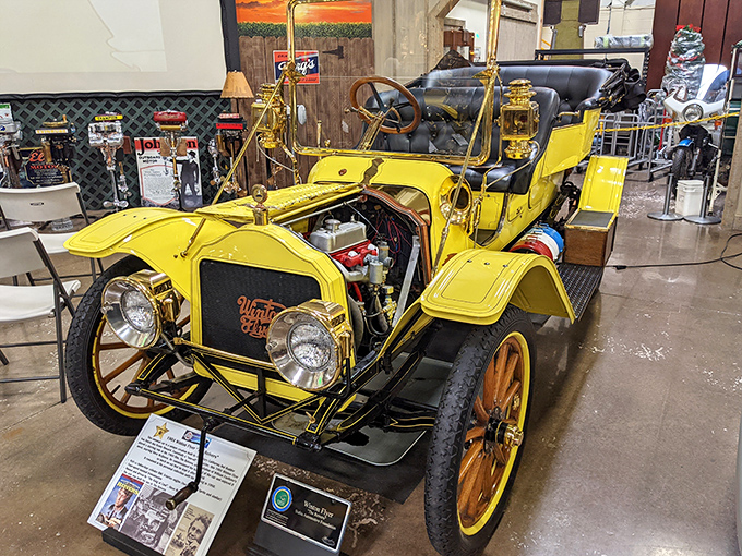 The bright yellow Winton Flyer looks ready to putt-putt into history, goggles and driving gloves absolutely required for proper operation.