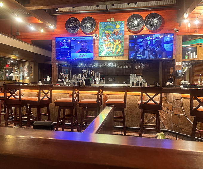 The bar isn't just serving drinks – it's dispensing liquid vacations in glasses, with bartenders as skilled as tropical alchemists.