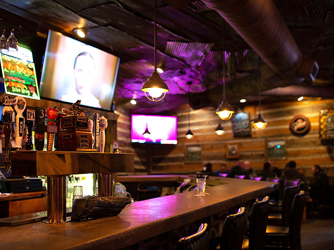 The bar area glows with warm invitation &ndash; where stories flow as freely as the drinks.