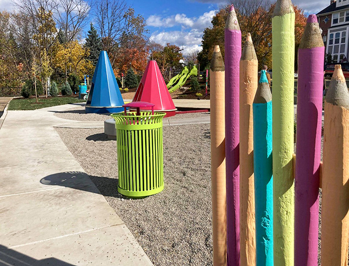 Primary-colored play structures pop against Wisconsin skies, offering both shelter from sun and fuel for imagination.