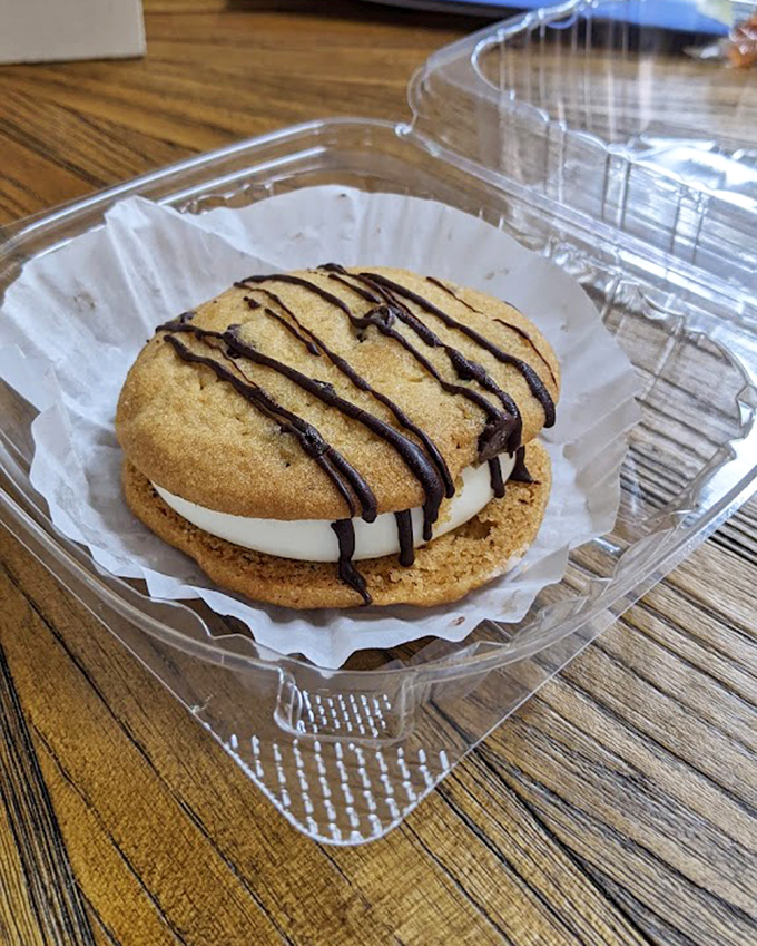 This isn't just a cookie sandwich &ndash; it's an architectural marvel of crispy edges, chewy centers, and cream filling worthy of worship.