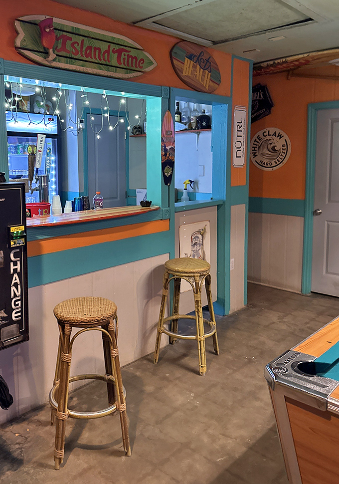 Surfboards and beach signs create the perfect backdrop for this tropical oasis where island time is the only schedule that matters.