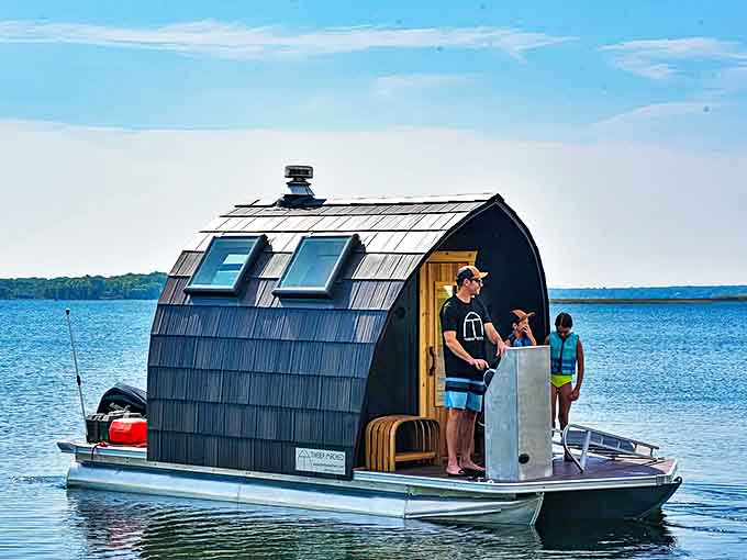 Mushroom-shaped seating creates an Alice-in-Wonderland-meets-Jurassic-Park vibe that somehow works perfectly in this quirky Michigan forest.
