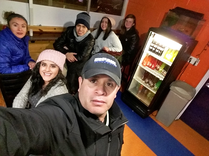 These smiling customers are clearly loving their experience, showing pure joy and satisfaction as they enjoy every moment together.