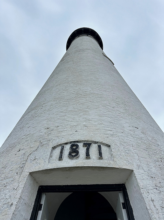 Lighthouse from another angle: Dating back to 1871, this towering structure has witnessed countless sunrises while standing guard over Michigan's maritime highway.