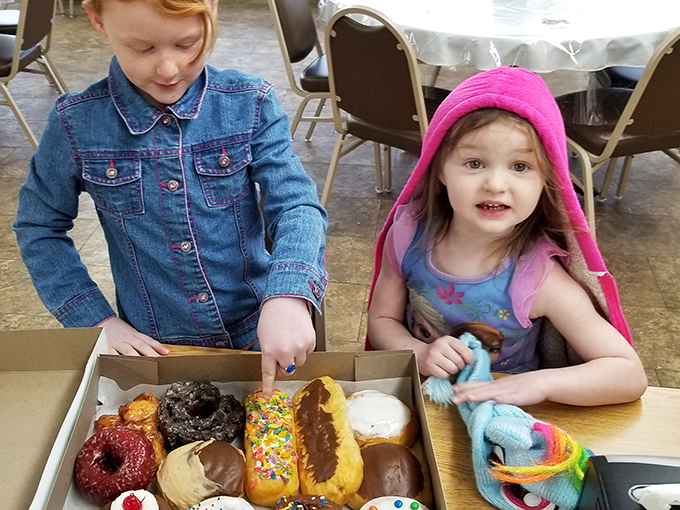Young donut enthusiasts face the delicious dilemma that has challenged generations before them &ndash; which magical creation to try first?
