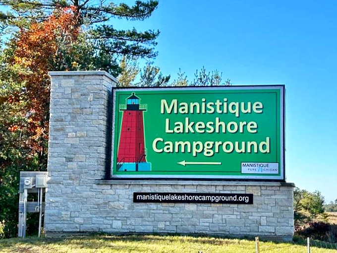 The nearby Manistique Lakeshore Campground welcomes outdoor enthusiasts with its distinctive lighthouse sign and convenient location.