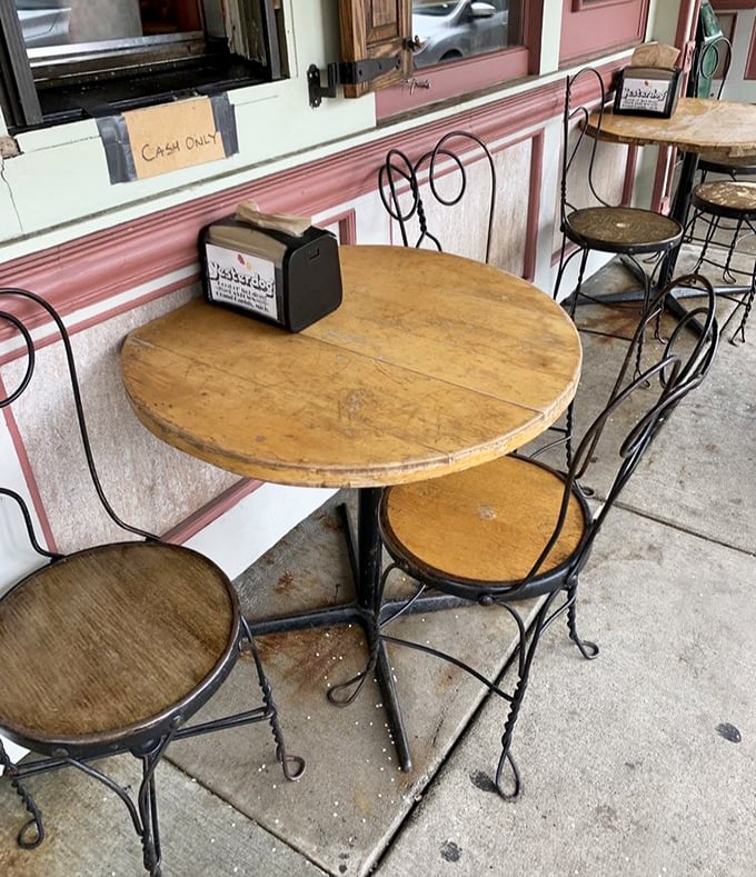 The outdoor seating offers a moment of respite &ndash; simple ice cream parlor-style tables where countless Yesterdog memories have been made.