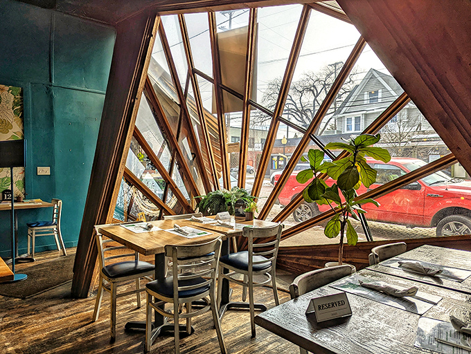 Those fan-shaped windows aren't just architectural showboats &ndash; they frame the outside world like living paintings while you dine.