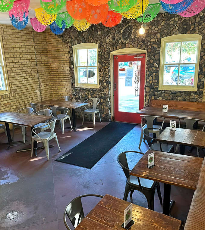 Simple wooden tables and metal chairs create an unpretentious space where the food does all the talking, and boy, does it have a lot to say.