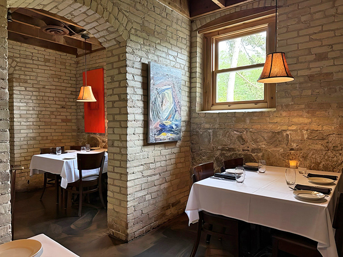 Intimate dining nooks carved from historic spaces offer the perfect setting for whispered conversations and lingering meals.