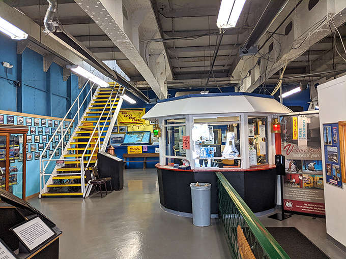 The visitor information area welcomes explorers to this floating museum. The booth's nautical design sets the tone for the maritime adventure that awaits.