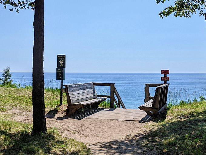 Rustic wooden benches offer front-row seats to Lake Michigan's ever-changing moods and colors.