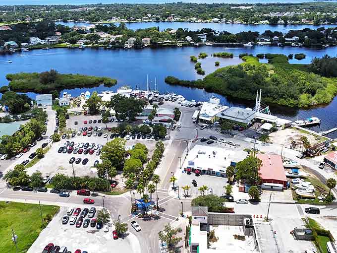 From above, the town reveals its perfect placement between blue waters and green spaces, a community that respects its natural boundaries.
