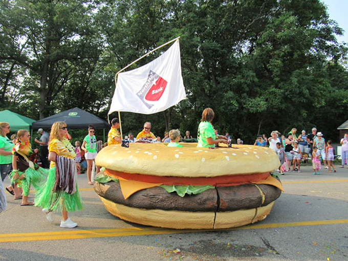 Even local banks get into the burger spirit, sponsoring floats that combine financial responsibility with tropical irresponsibility.