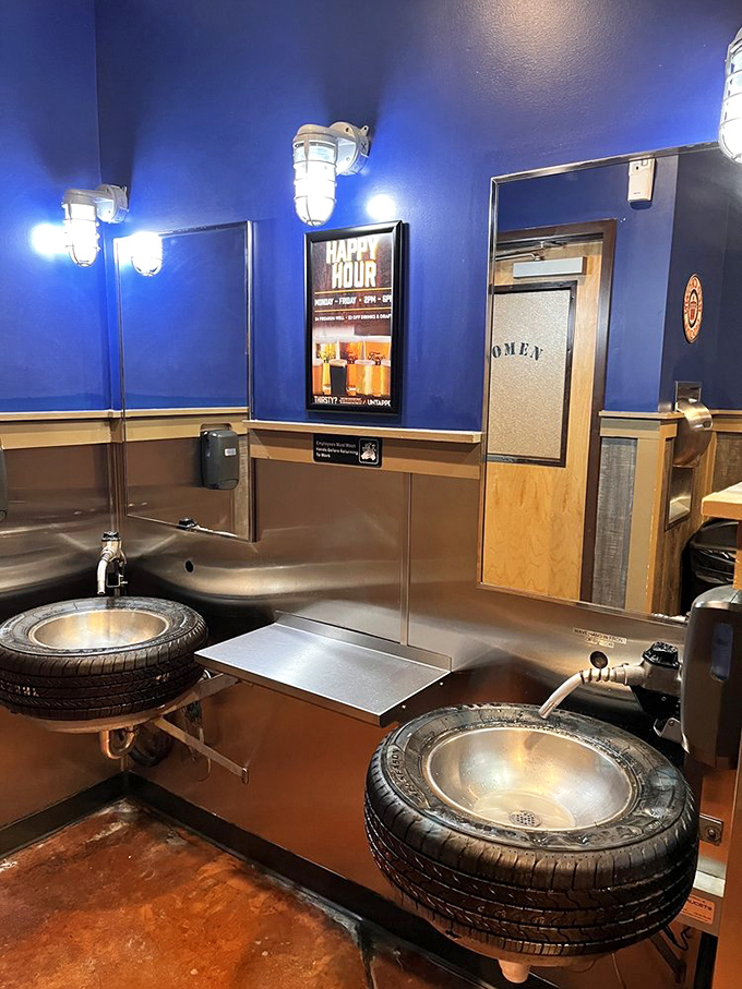 Even the restrooms stay on theme with these ingenious tire-basin sinks and gas-pump faucet handles, proving no detail was too small for consideration.