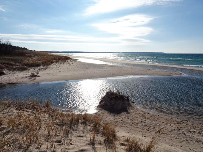 Where land, water, and sky converge in perfect harmony, creating Michigan's version of a natural infinity pool.