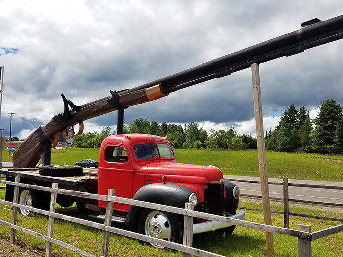 The world's largest working rifle stretches impressively across its display, ready to launch bowling balls during special demonstrations.