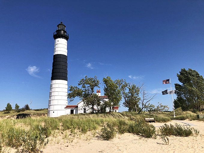 Big Sable Point Lighthouse stands tall in black and white majesty, a 112-foot exclamation point at the end of nature's perfect sentence.