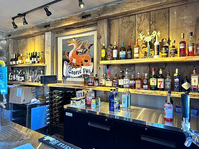 The castle pub's rustic bar invites visitors to raise a glass, proving that medieval aesthetics and modern mixology make perfect companions.