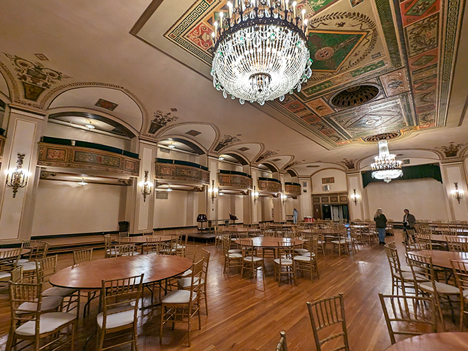 The Crystal Ballroom awaits its next gala with gleaming chandeliers and a ceiling that would make Versailles jealous.