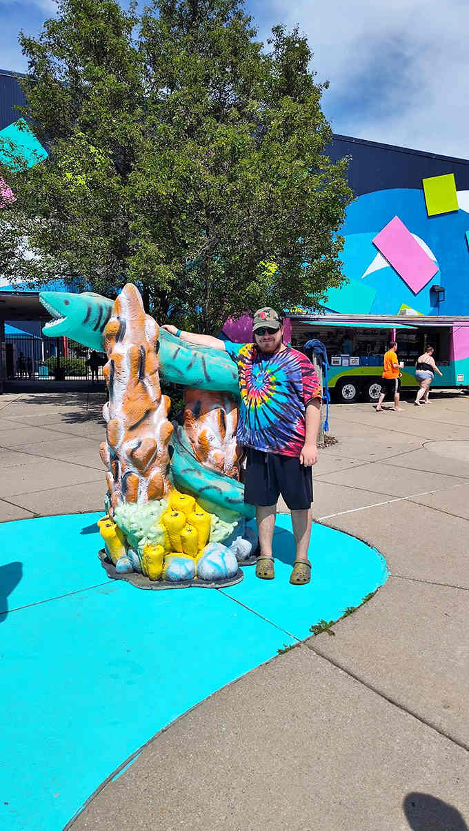 This cheerful sea creature statue greets visitors with a smile, setting the playful tone before you even get your feet wet.