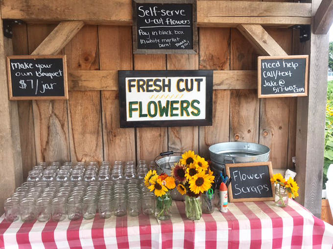 DIY flower heaven! Mason jars await your personal touch at the self-serve cutting station &ndash; therapy at just $1 per arrangement.