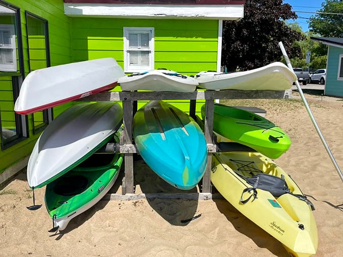 A rainbow of kayaks waits for adventurers to explore Lake Huron's crystal waters &ndash; no experience necessary, just curiosity!