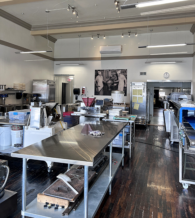Stainless steel workstations where magic happens – a laboratory of deliciousness where recipes passed down through generations come to life daily.