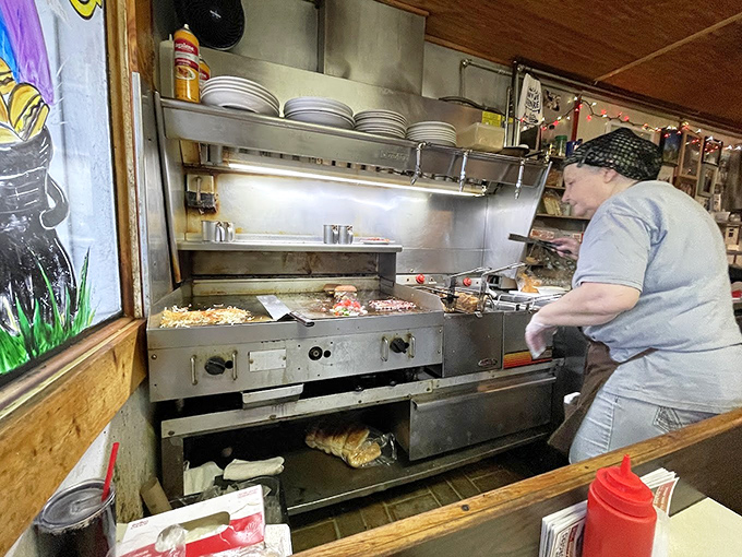 Kitchen: The command center where burger magic happens &ndash; a well-choreographed dance of spatulas and sizzle that's been perfected over decades.