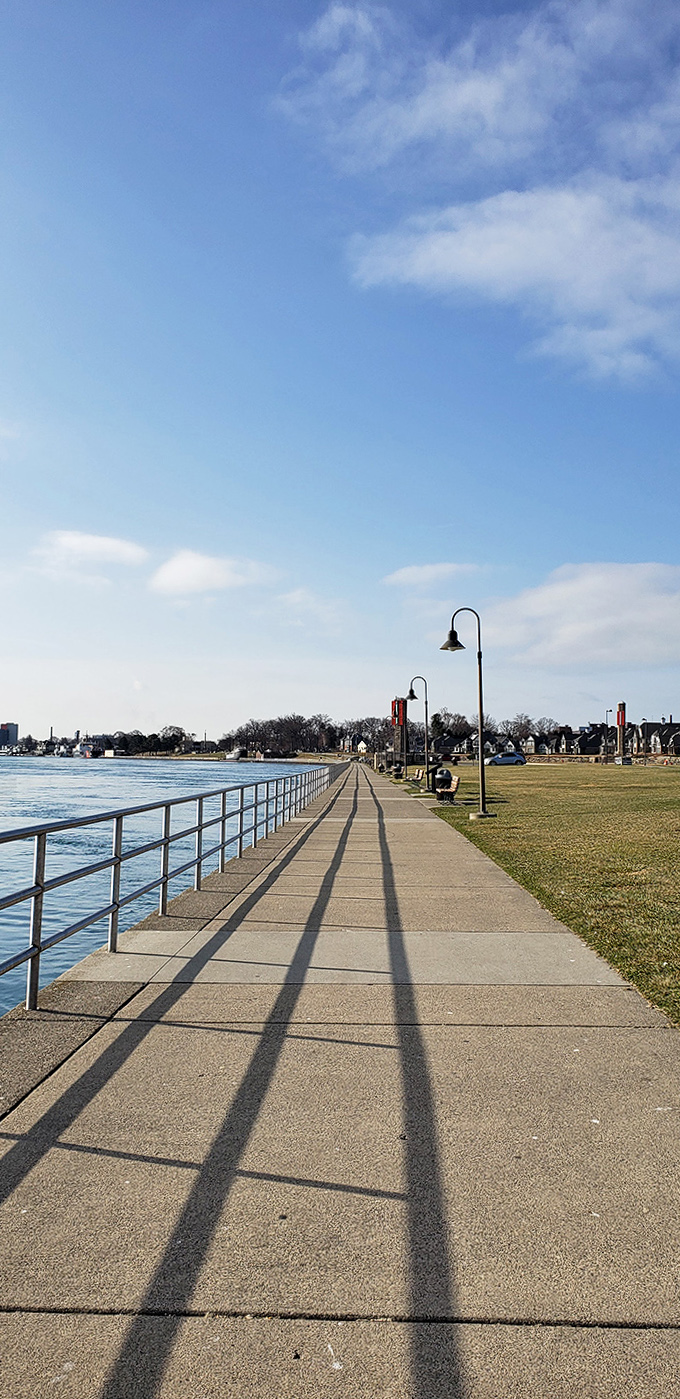 The long, inviting concrete walkway stretches into the distance, promising adventures and views that make every step worthwhile.