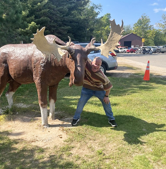 The moose statue provides scale for visitors who thought bears were the only impressively-sized mammals in Michigan's forests.