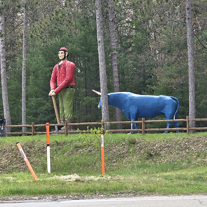 Paul and Babe create a perfect photo opportunity, with their massive scale making everyone feel like they've stepped into a storybook.