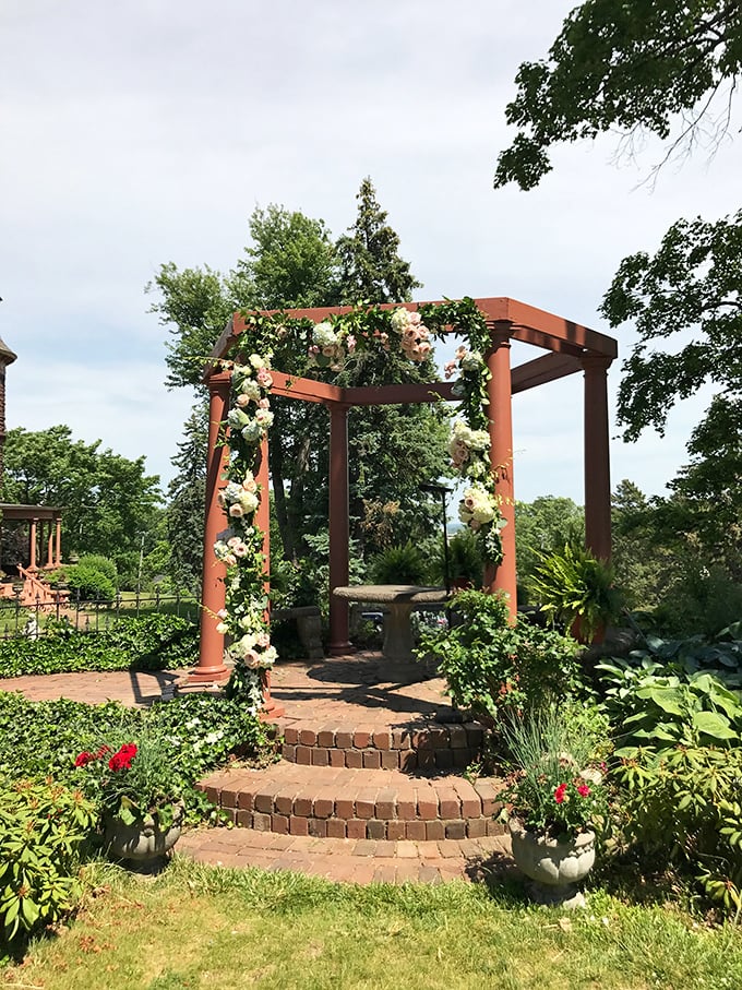 This flower-adorned pergola creates a picture-perfect setting for romantic moments and special celebrations amid the castle grounds.