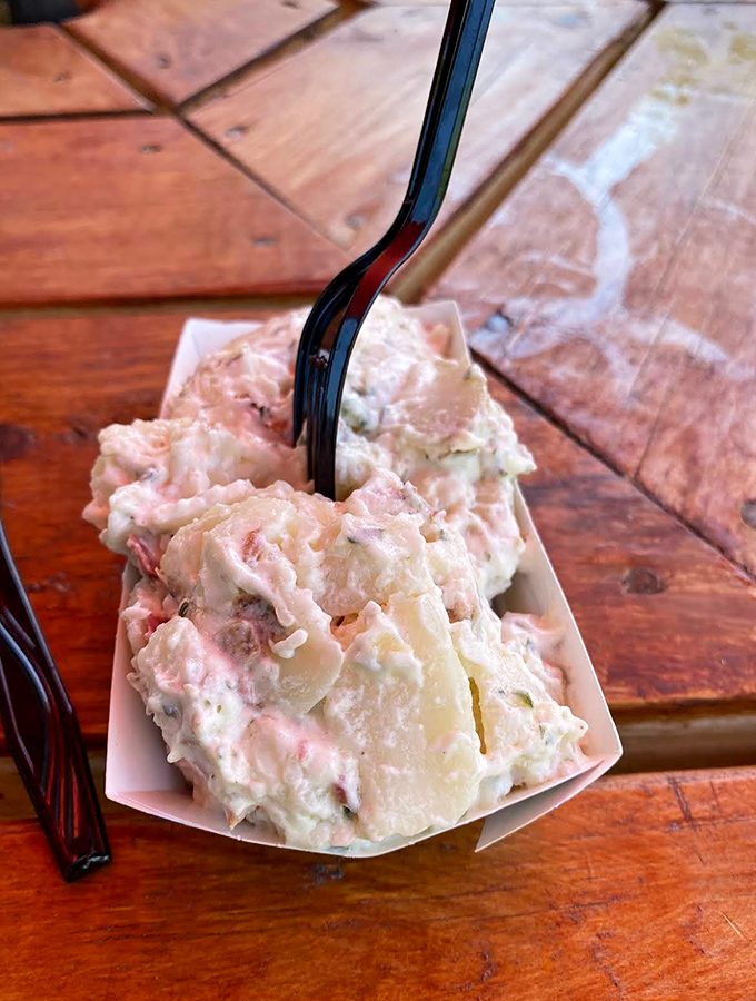 The potato salad might be a side dish, but it refuses to be sidelined &ndash; creamy, herby, and the perfect companion to any hot dog creation.