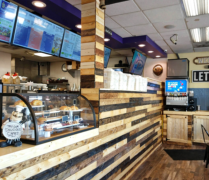 Rustic wood paneling adds warmth to the counter area, where a display case tempts you with homemade desserts that shouldn't be skipped.