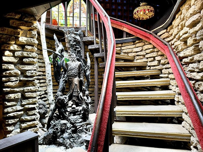 Intricate woodwork and glowing blue glass transform this doorway into a portal between worlds, inviting brave souls forward.