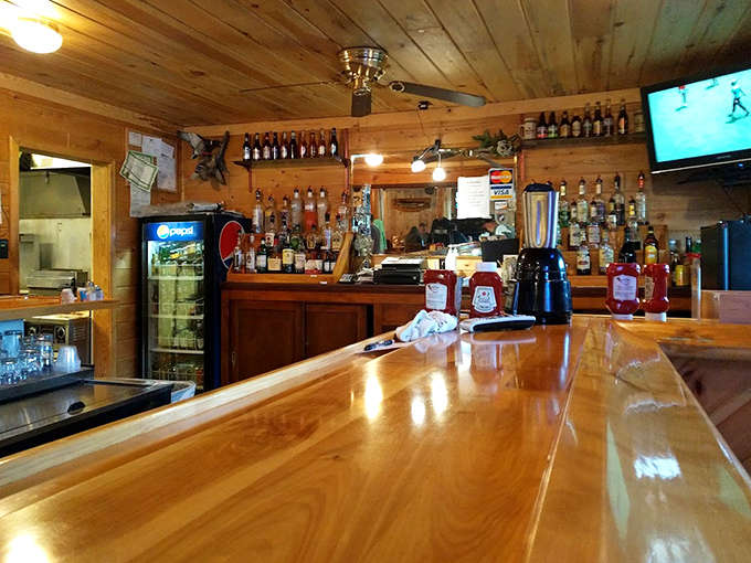 The welcoming bar area where locals swap fishing tales that grow more impressive with each retelling.