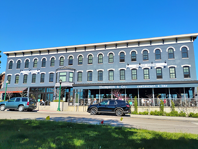 Thompson & Co.'s blue facade houses culinary delights, where locals gather to share meals, stories, and the simple pleasure of breaking bread together.