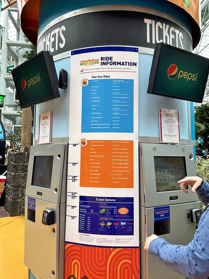 The ticket kiosks stand ready to exchange your money for memories, with helpful height requirement information to prevent disappointment and meltdowns.