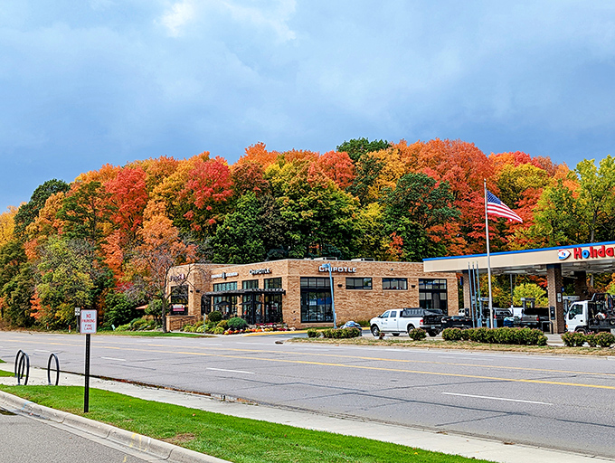 Fall foliage creates a fiery backdrop for Wayzata's stone buildings, nature's way of reminding us that change can be breathtakingly beautiful.