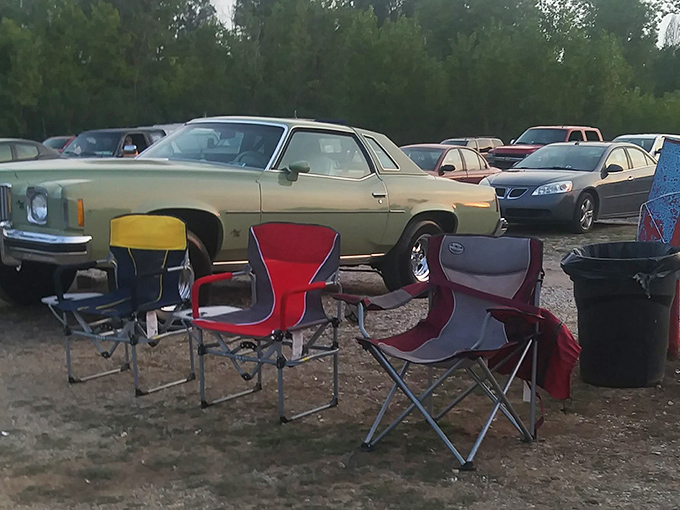 The drive-in's unofficial living room setup, where lawn chairs form front-row seats under the greatest ceiling ever created &ndash; the night sky.