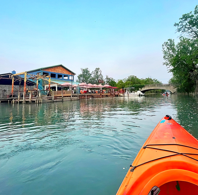 Crystal clear waters mirror the sky, creating a perfect paddling paradise hidden within Detroit's east side neighborhoods.