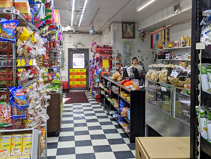 The checkout area where your culinary adventure begins, surrounded by colorful candies and treats from south of the border.