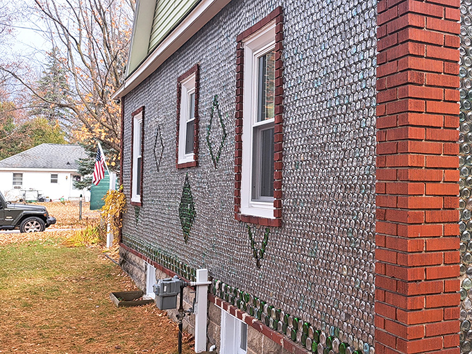 Closer inspection shows the meticulous placement of each bottle, their bases creating a textured surface that catches light differently throughout the day.