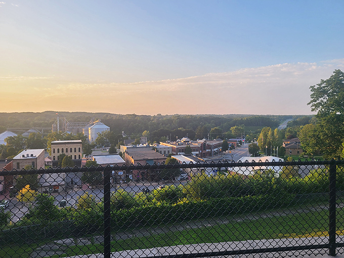 Sunset bathes Newaygo in golden light, transforming this working town into a postcard-perfect scene of Midwestern charm nestled among rolling hills.