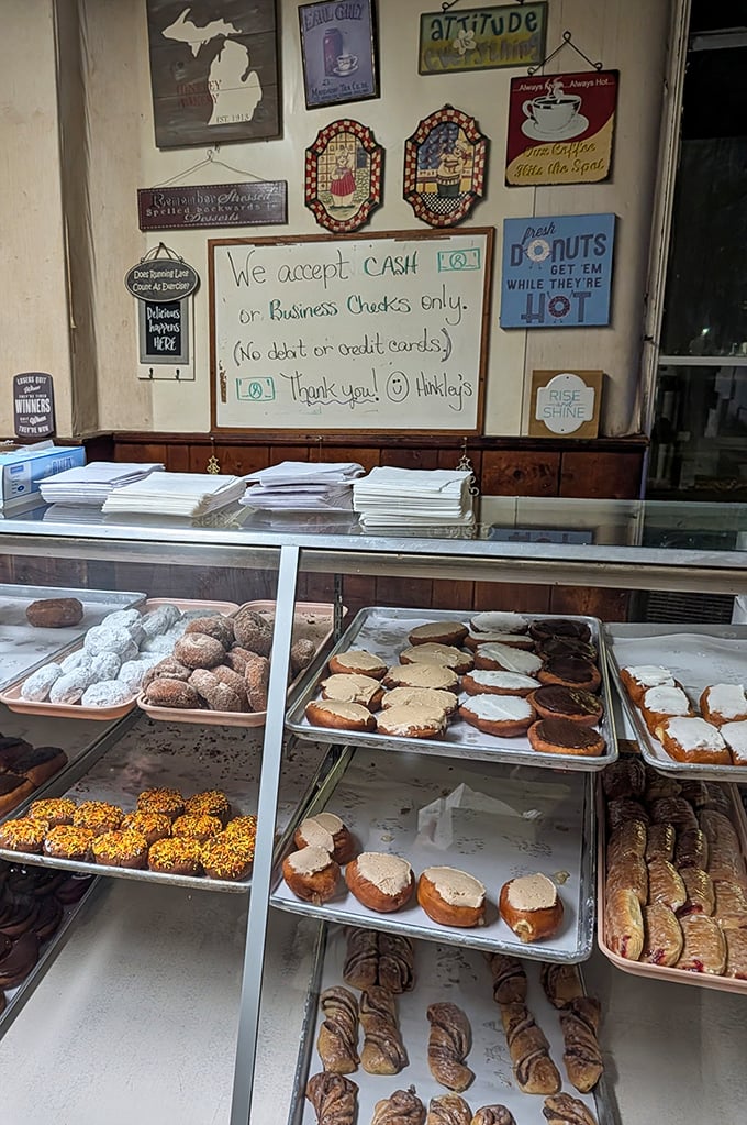 The counter area, with its charming signs and no-nonsense approach, reminds us that sometimes the best experiences come without digital bells and whistles.