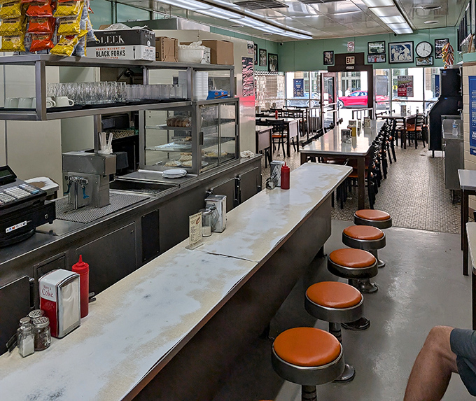 Counter seating that's witnessed decades of Detroit history, one hungry customer at a time. The perfect spot for coney contemplation.