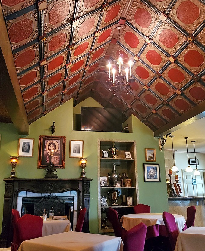 Dining beneath ornate wooden ceilings feels like eating in a European cathedral. Every meal becomes a sacred experience here.